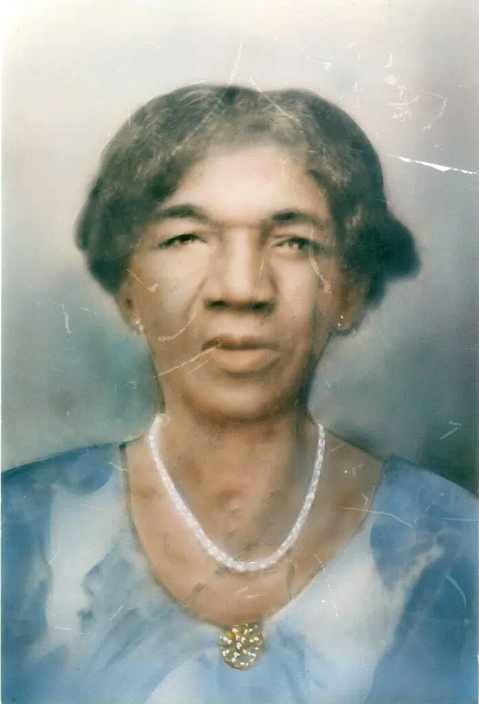 The story behind the woman in the blue dress